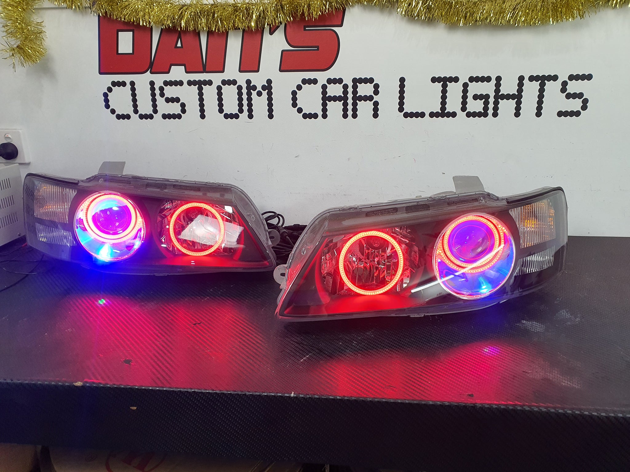 Holden VZ Commodore Projector Headlights with Multicolored Halorings ...