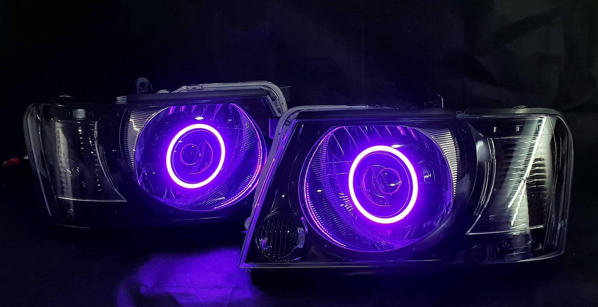 Nissan Patrol GU S4 Headlights with Multicoloured Halo Rings ...